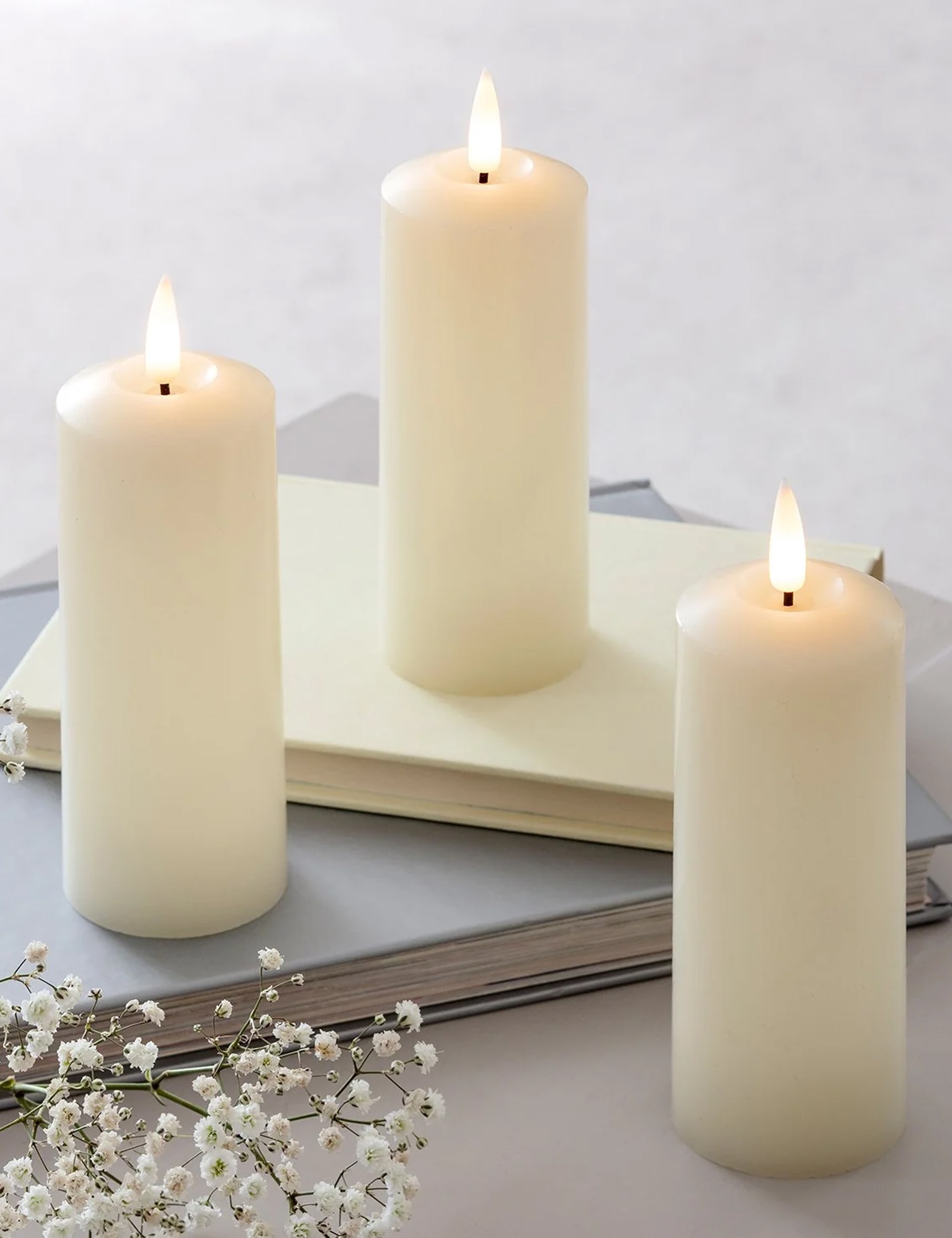 Set of 3 TruGlow® Skinny Pillar LED Candles | Lights4fun | M&S