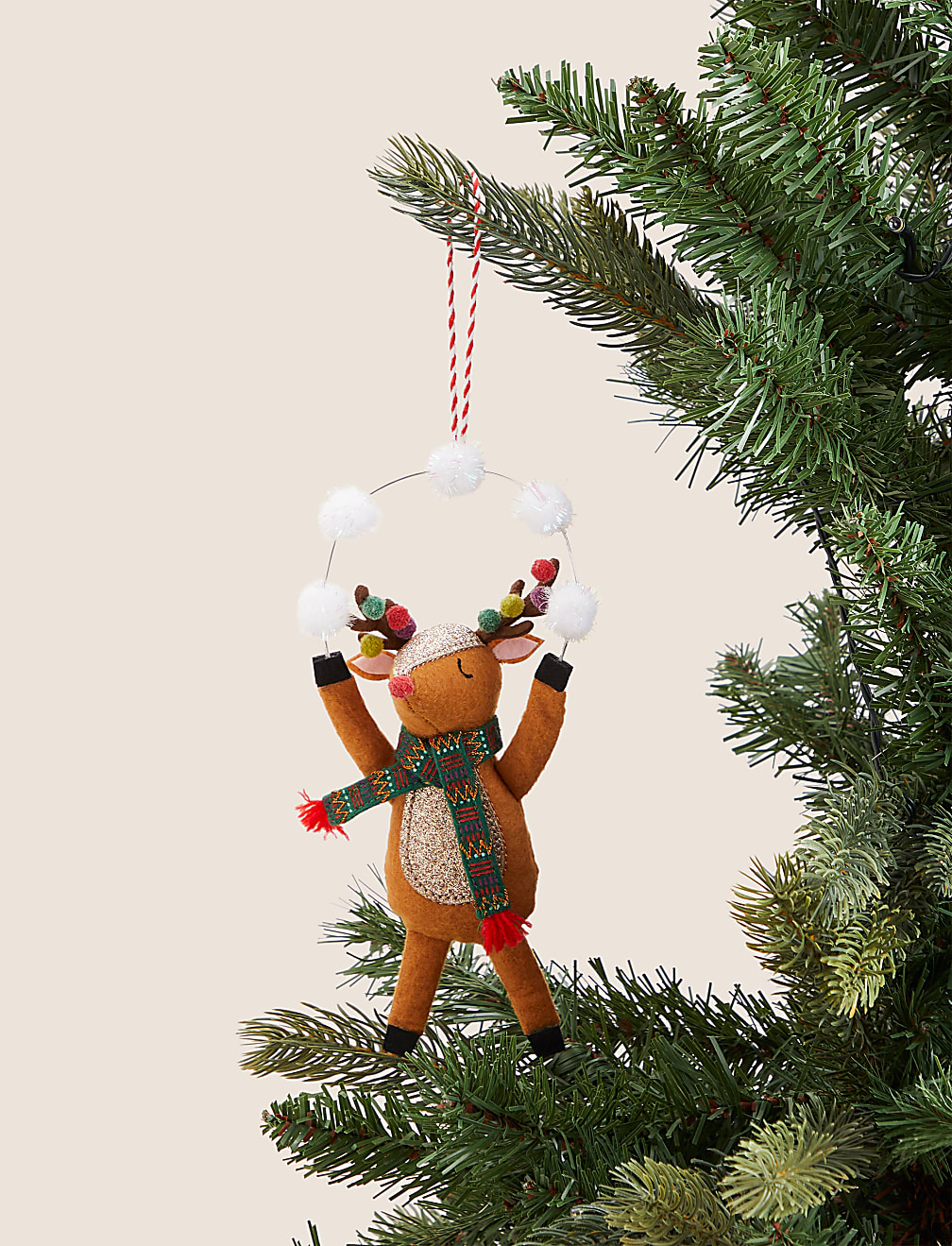 Buy Felt Juggling Reindeer Hanging Decoration at Marks & Spencer
